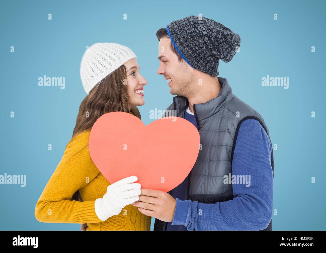 Romantic couple holding heart shape Stock Photo - Alamy