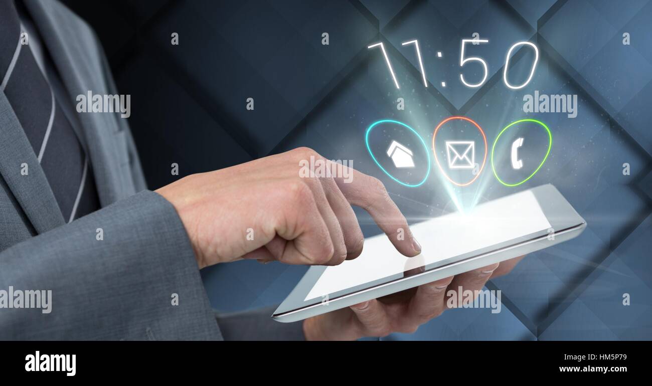 Businessman using tablet with icons Stock Photo - Alamy