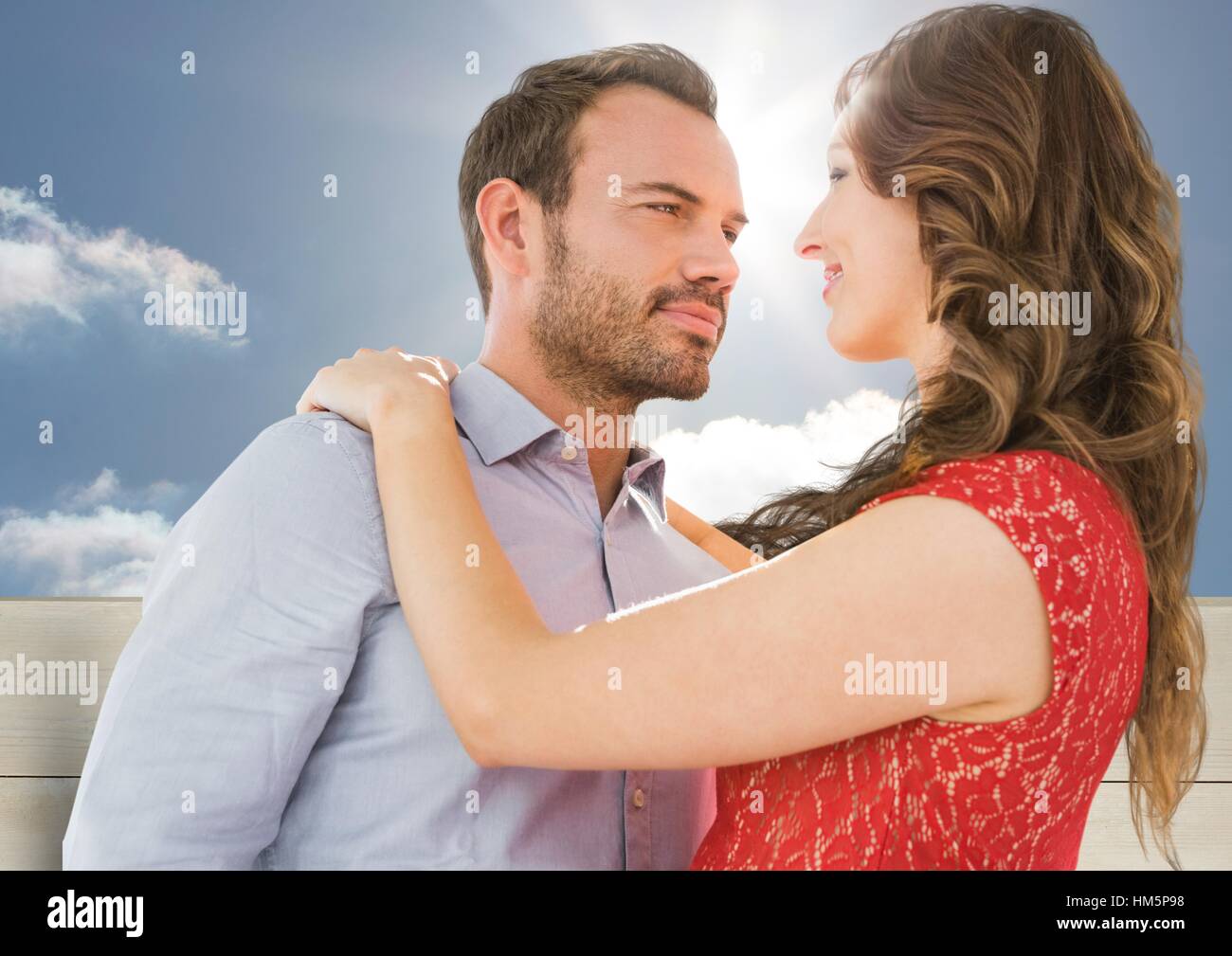 Romantic couple embracing face to face Stock Photo - Alamy