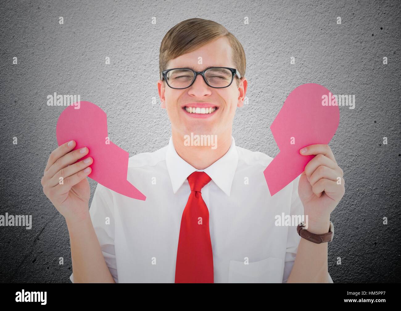 Crying man holding broken heart Stock Photo - Alamy