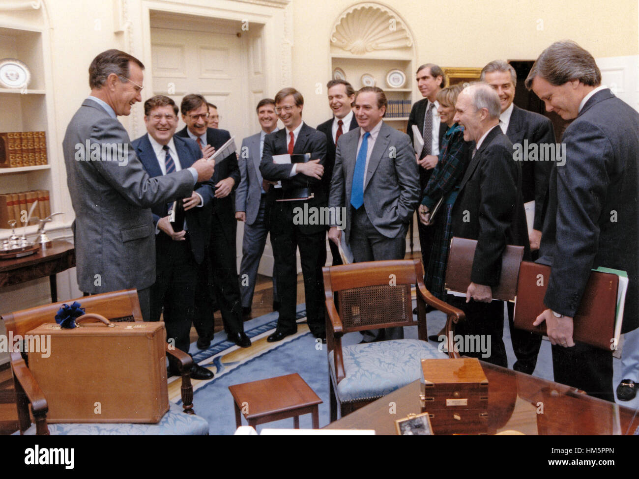 United States President George H.W. Bush receives a birthday gift from ...