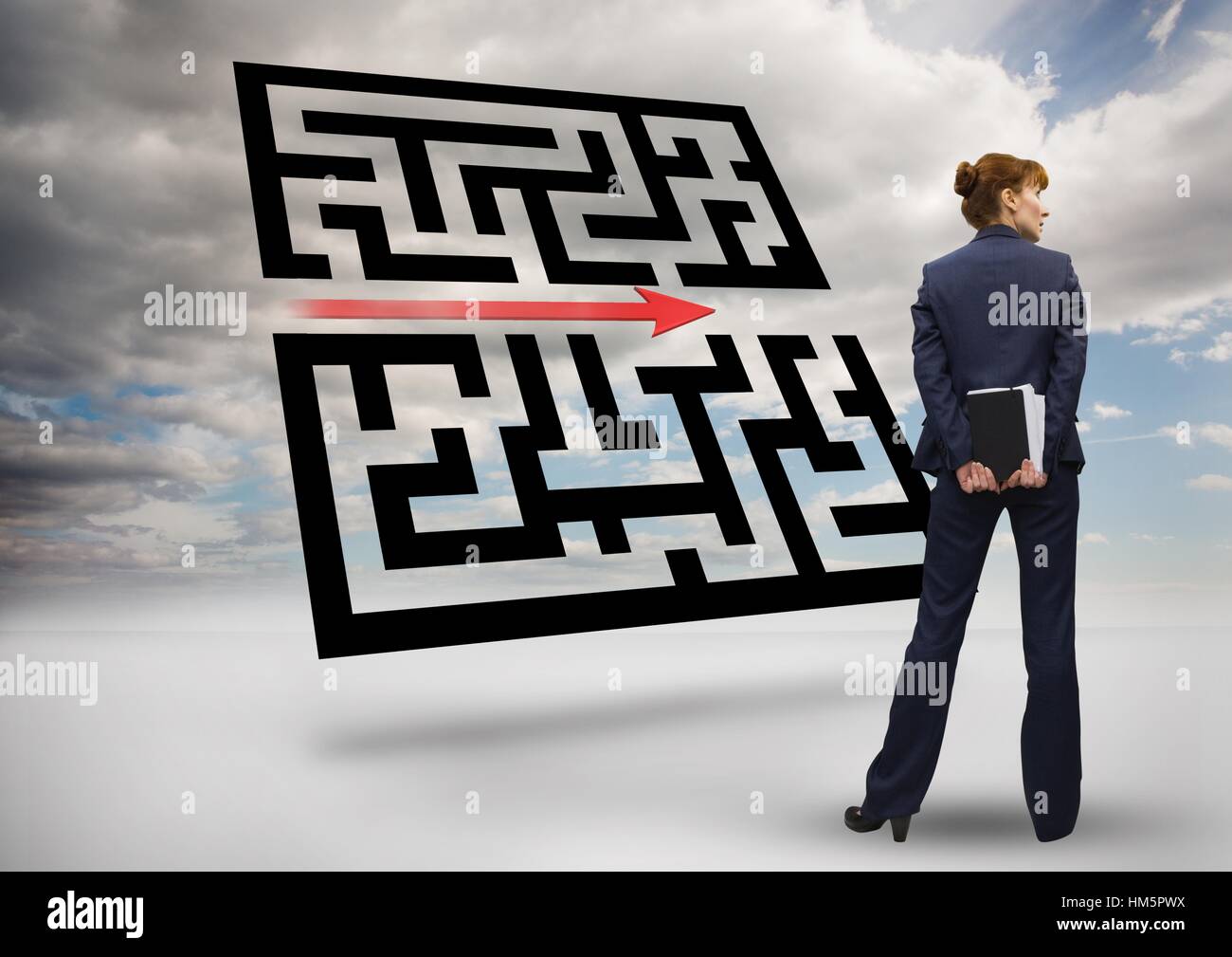 Business woman standing with diary Stock Photo - Alamy