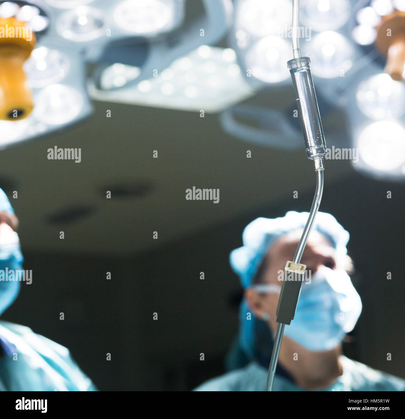 IV medical drip in surgery in operating theater emergency room knee ...
