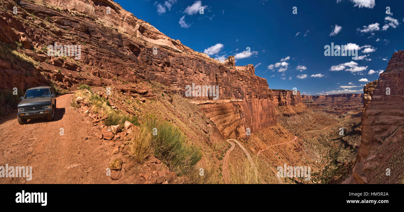 Vehicle on Shafer Trail switchbacks inside Shafer Canyon, Canyonlands ...