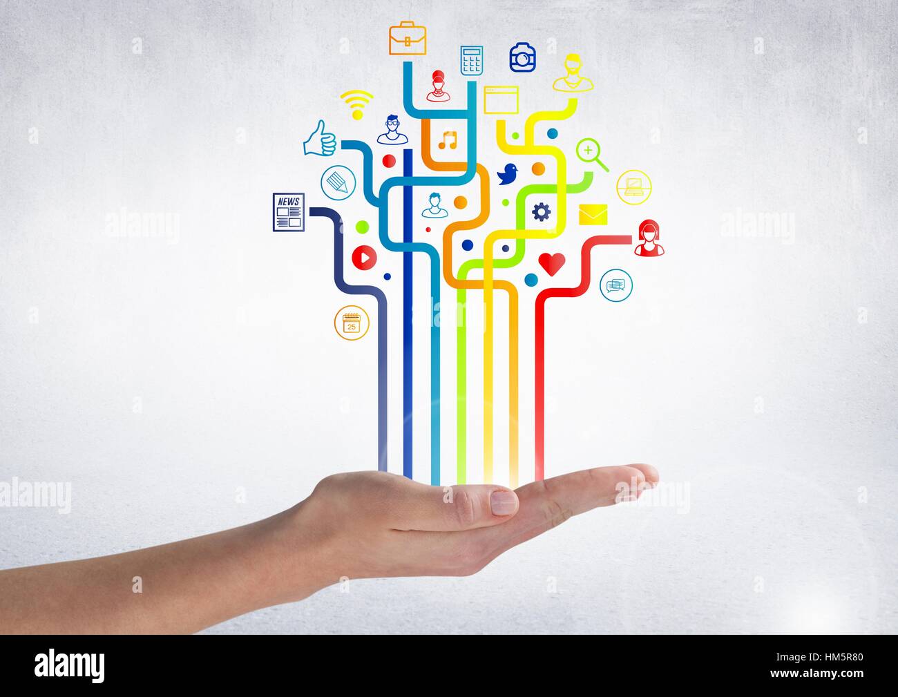 Hand holding digitally generated application icon interface Stock Photo ...
