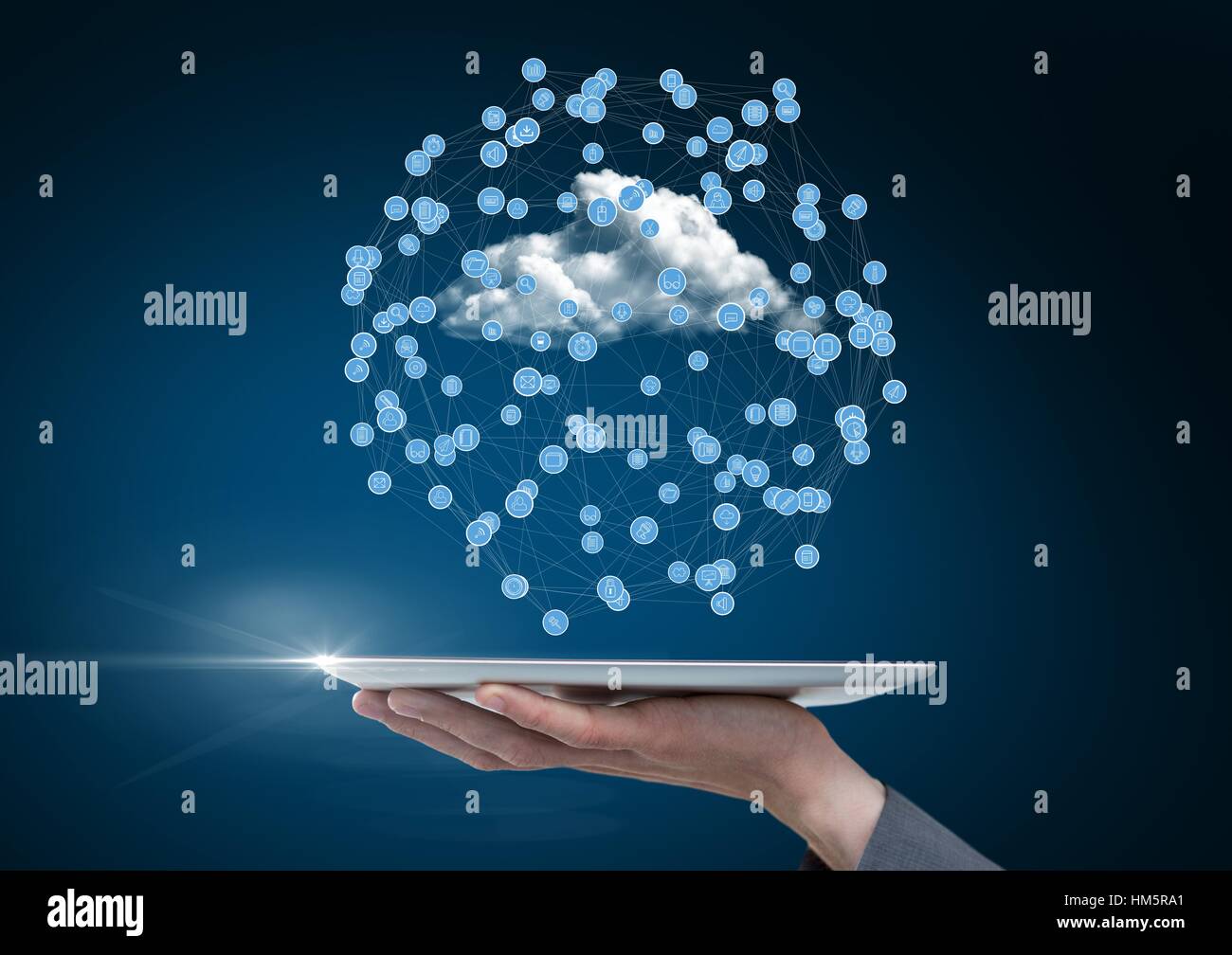 Hand with digital tablet connecting digitally generated icons Stock ...