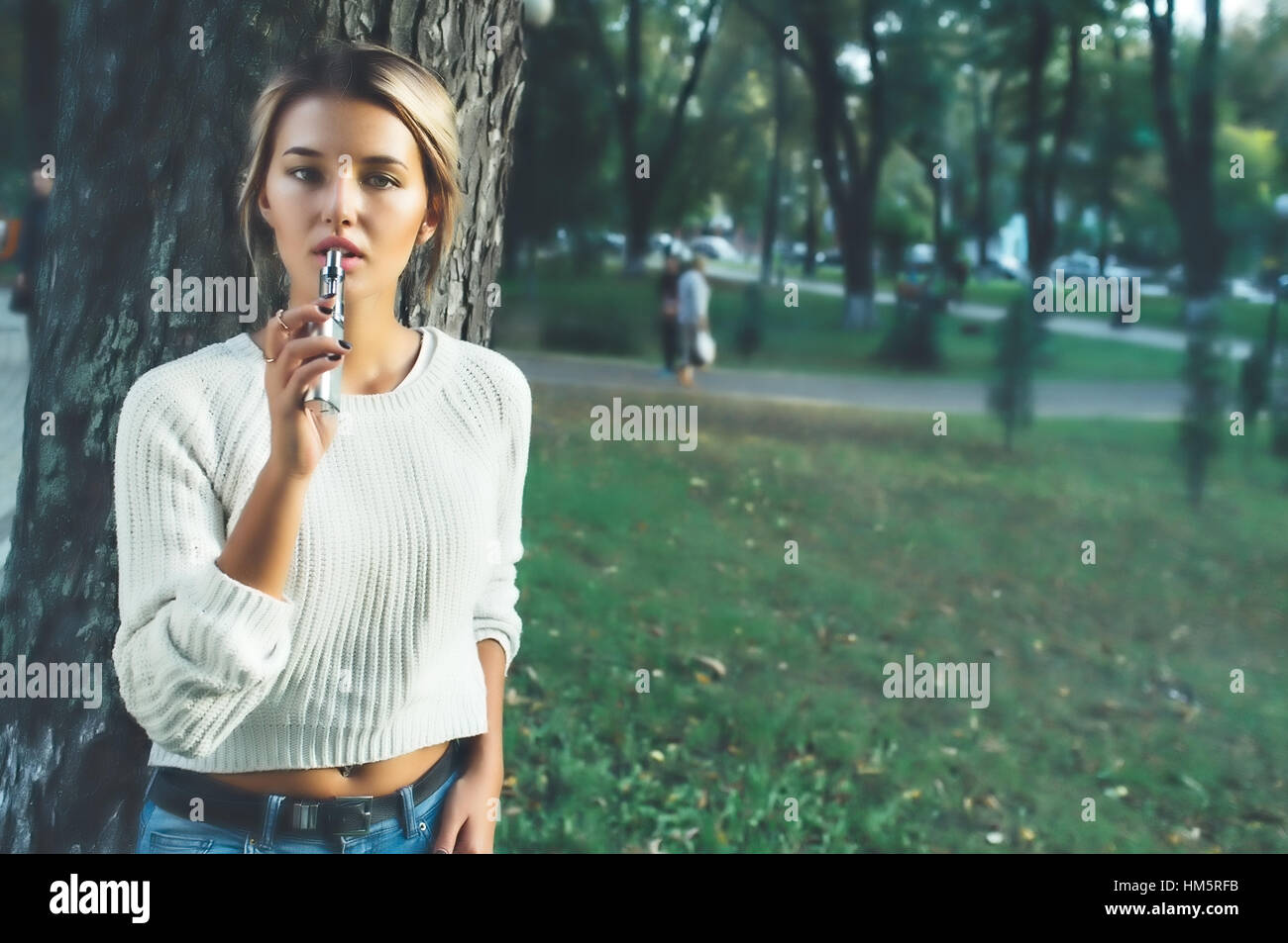 Blonde girl smoking hi-res stock photography and images - Alamy
