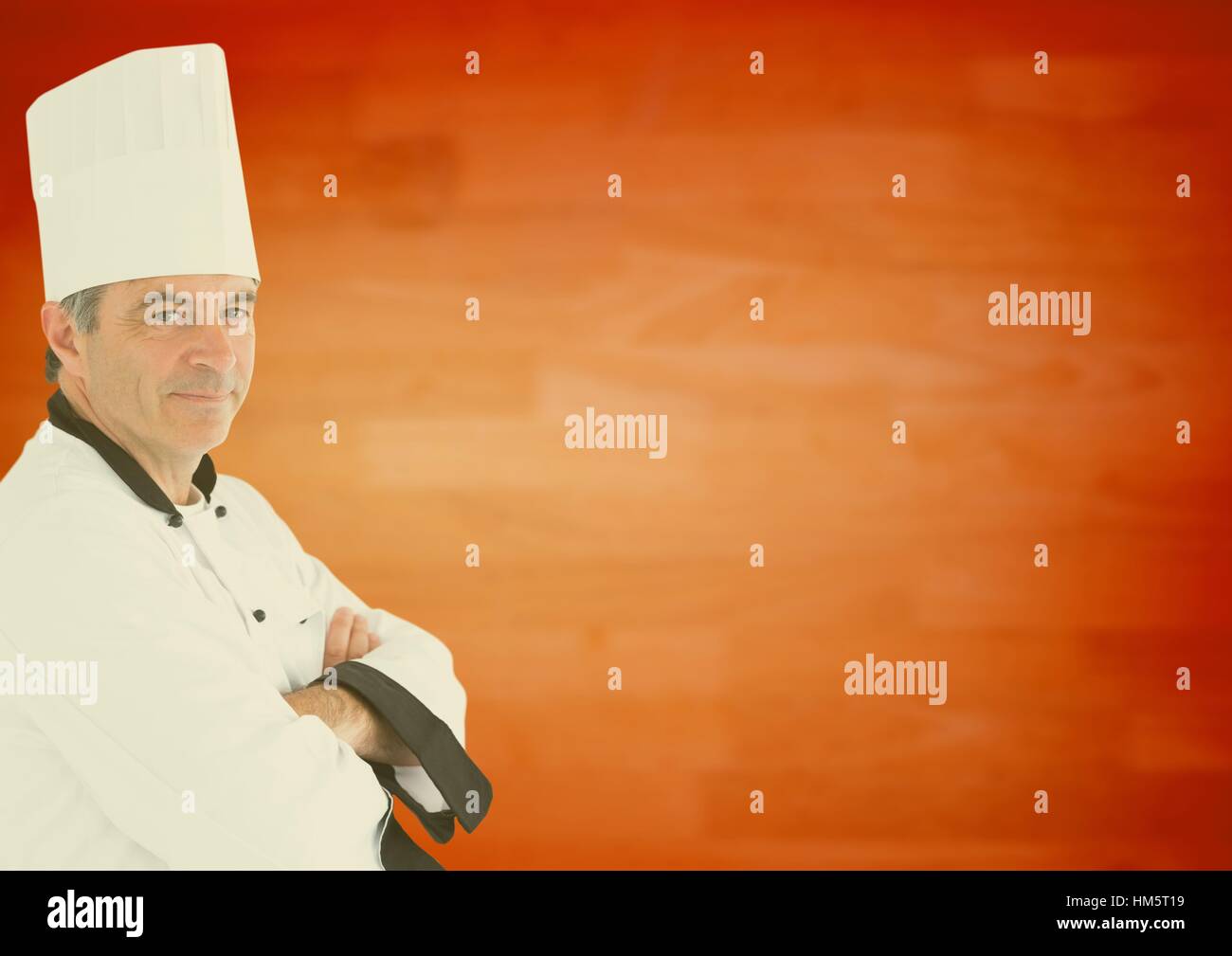 Portrait of chef standing with arms crossed Stock Photo - Alamy