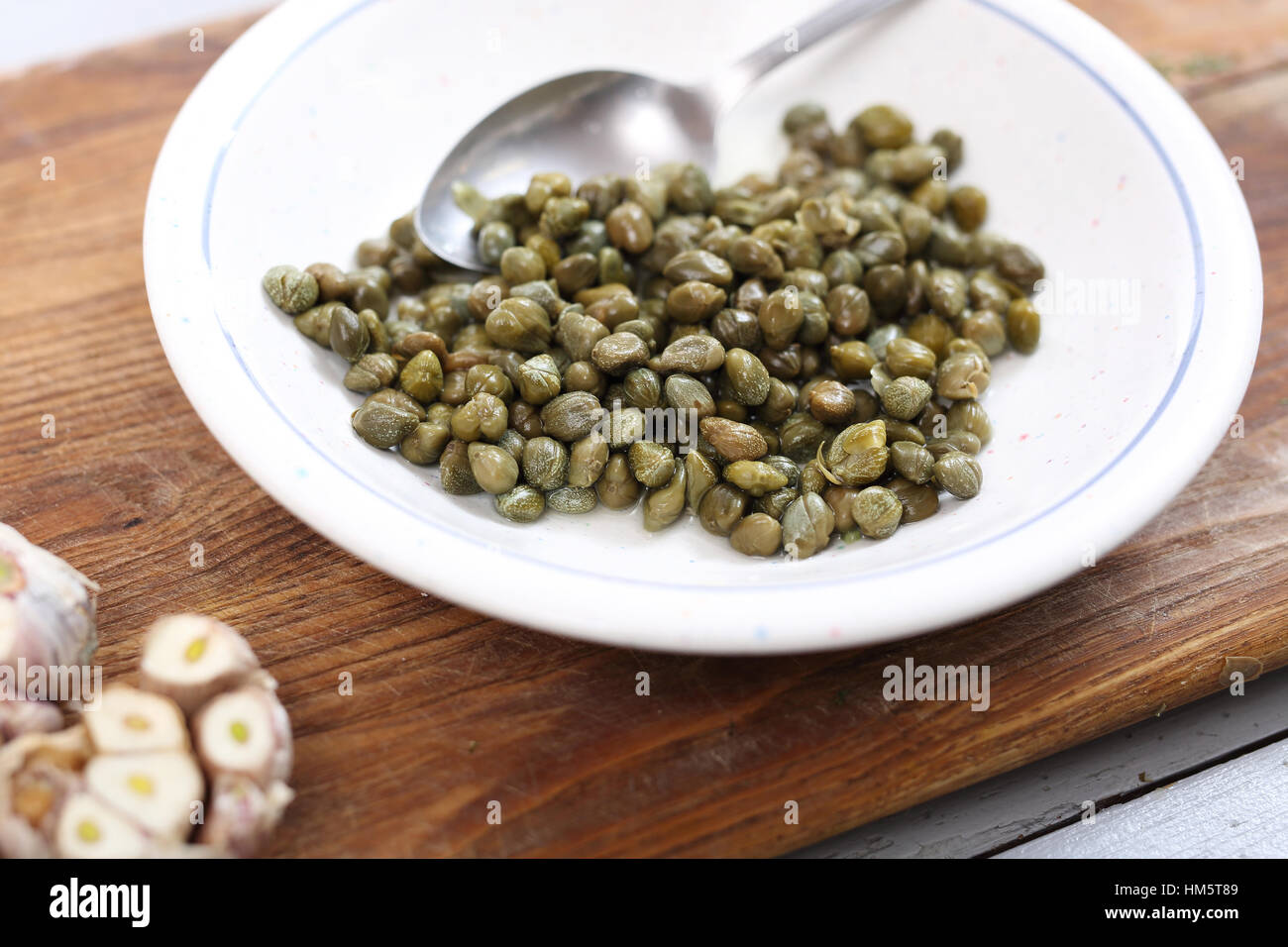 Caper in plate kitchen hi-res stock photography and images - Alamy