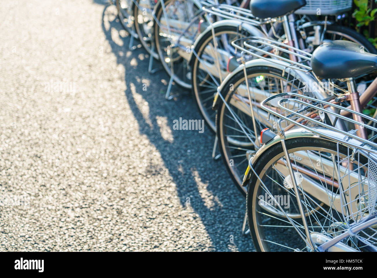Row of bikes parking Stock Photo - Alamy