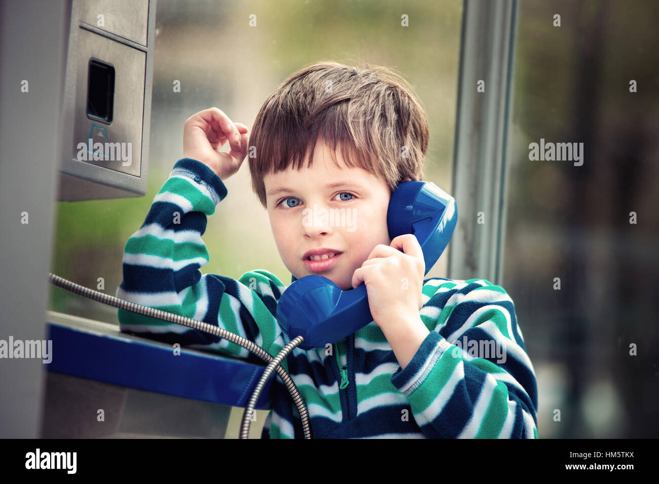 Boy with telephone headset hi-res stock photography and images - Alamy