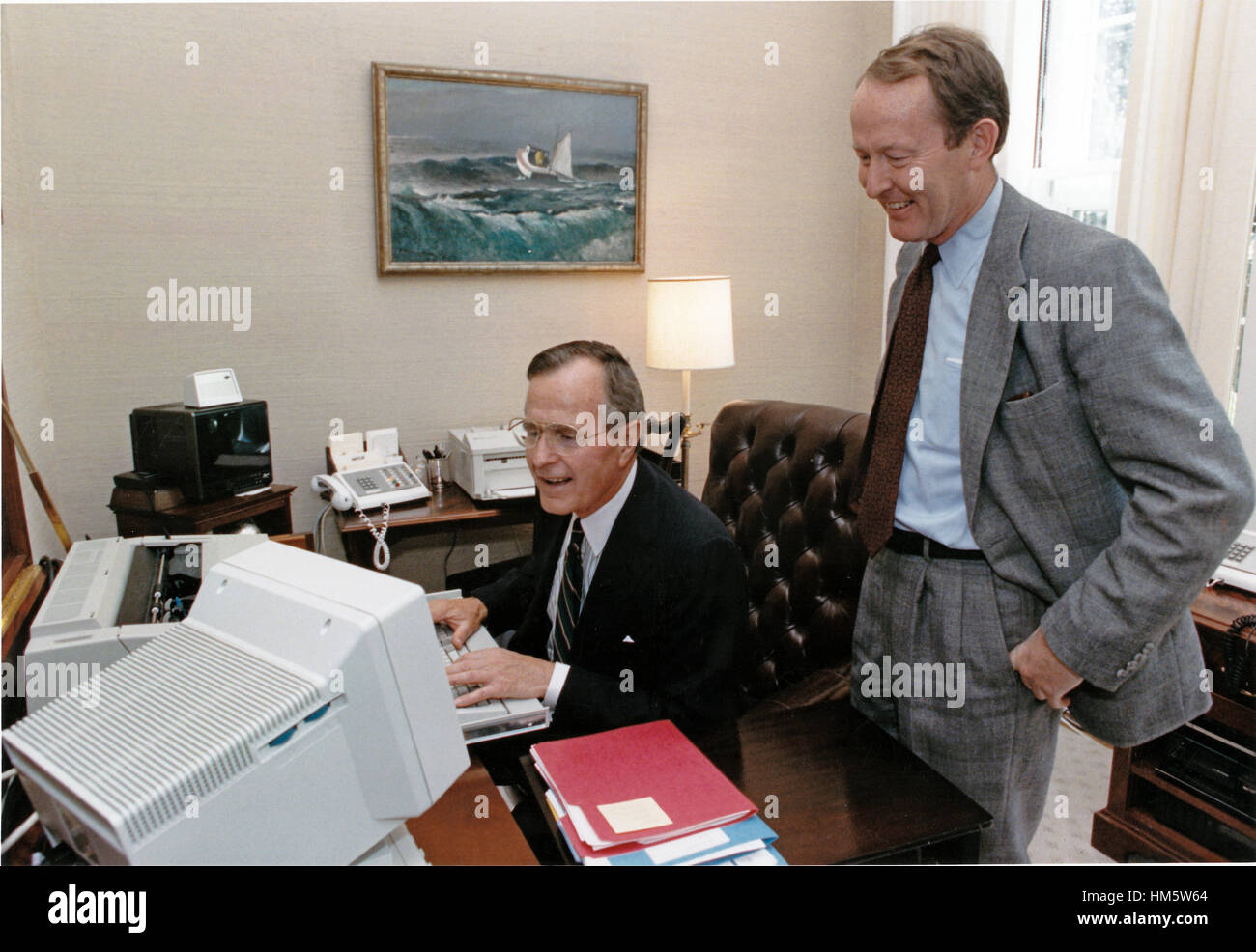 United States President George H.W. Bush shows his computer skills to U ...