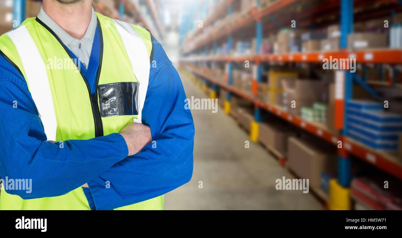 Mid section of supervisor standing with arms crossed Stock Photo - Alamy