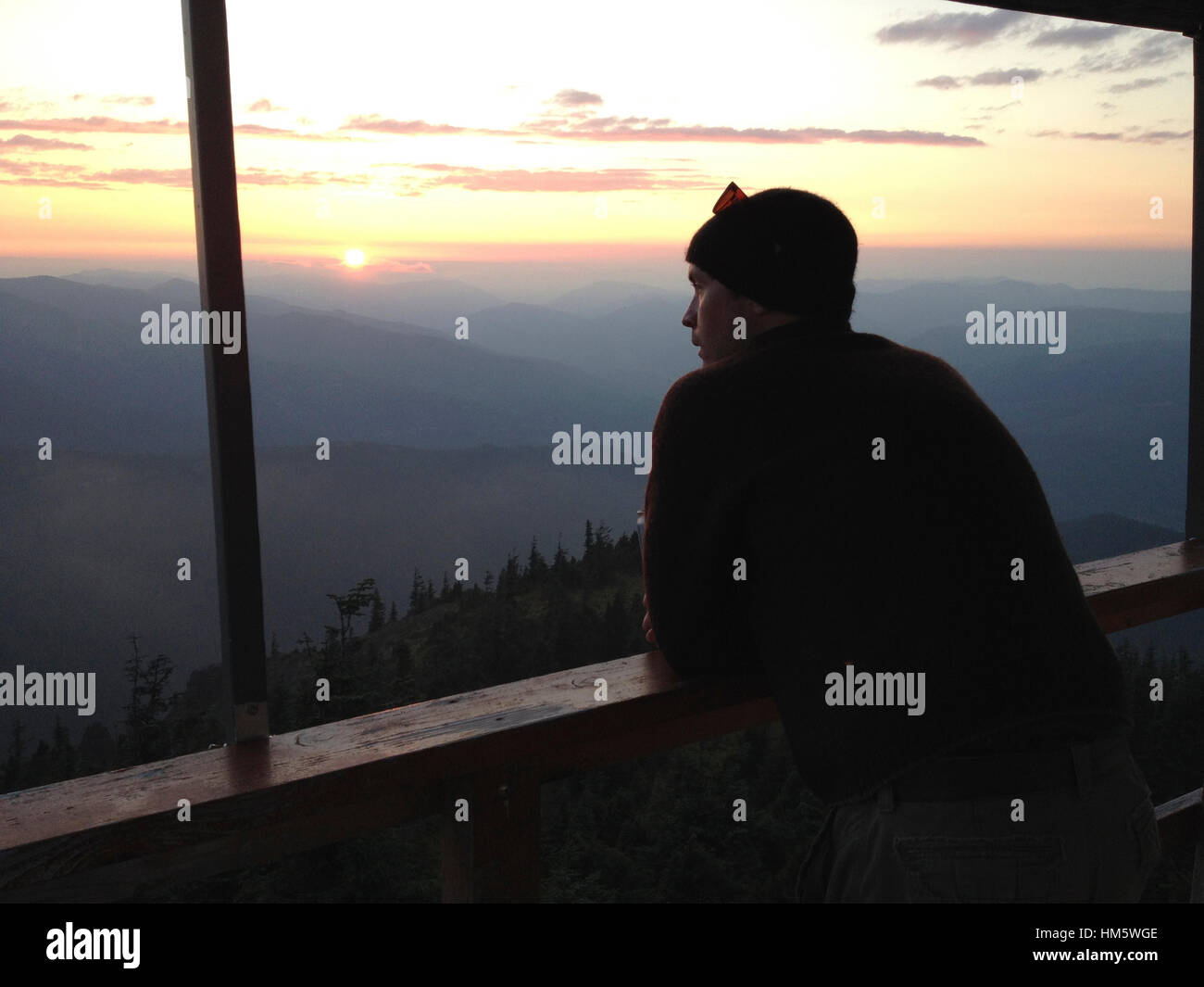 Man leaning on railing hi-res stock photography and images - Alamy