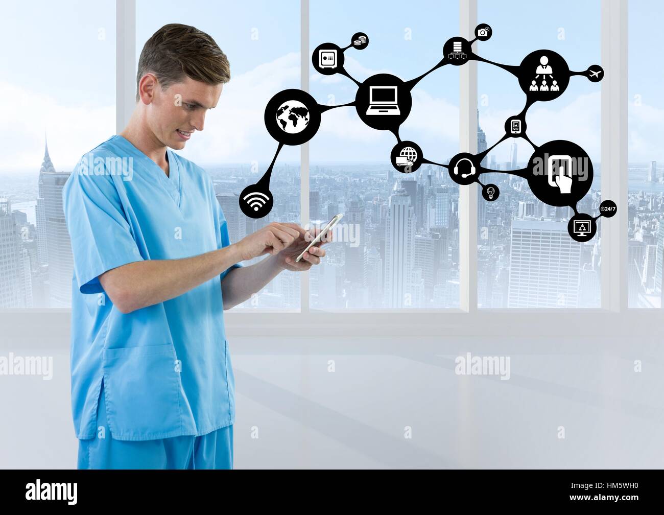 Doctor using mobile phone with application icon Stock Photo - Alamy