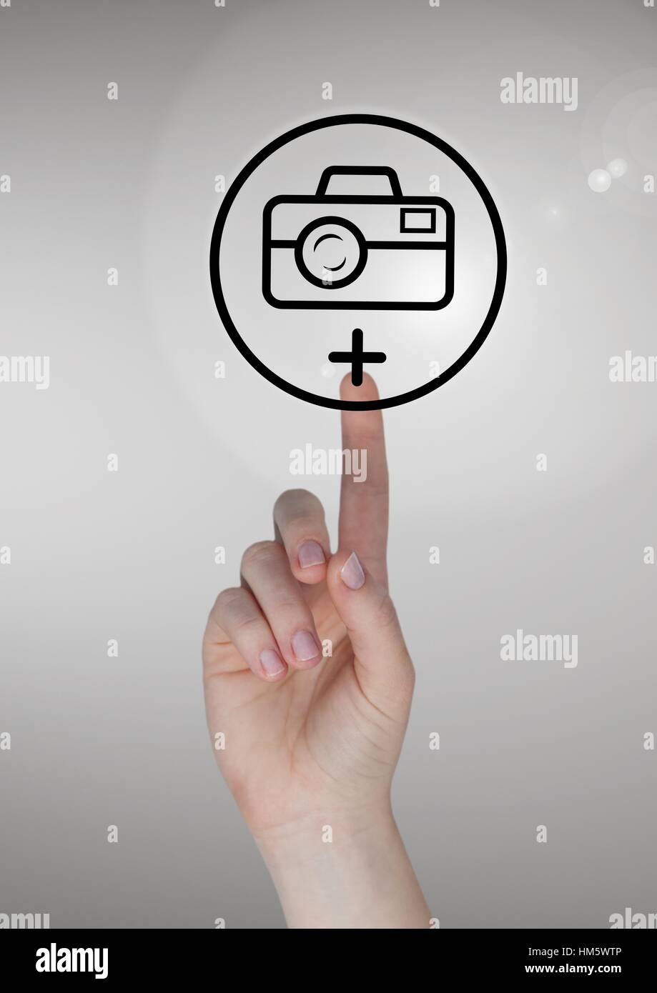 Hand touching photo camera icon Stock Photo - Alamy