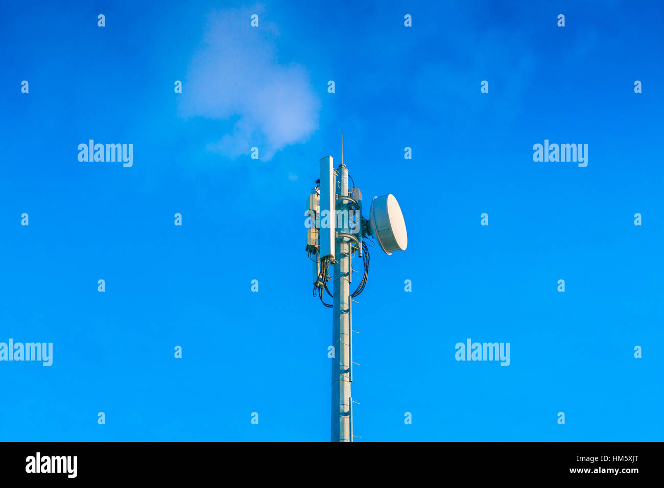 Telecommunication tower with beautiful sky Stock Photo - Alamy