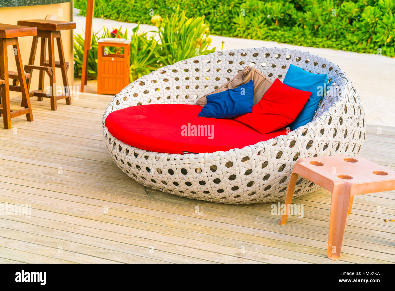 Relaxing seats at Swimming pool Stock Photo - Alamy