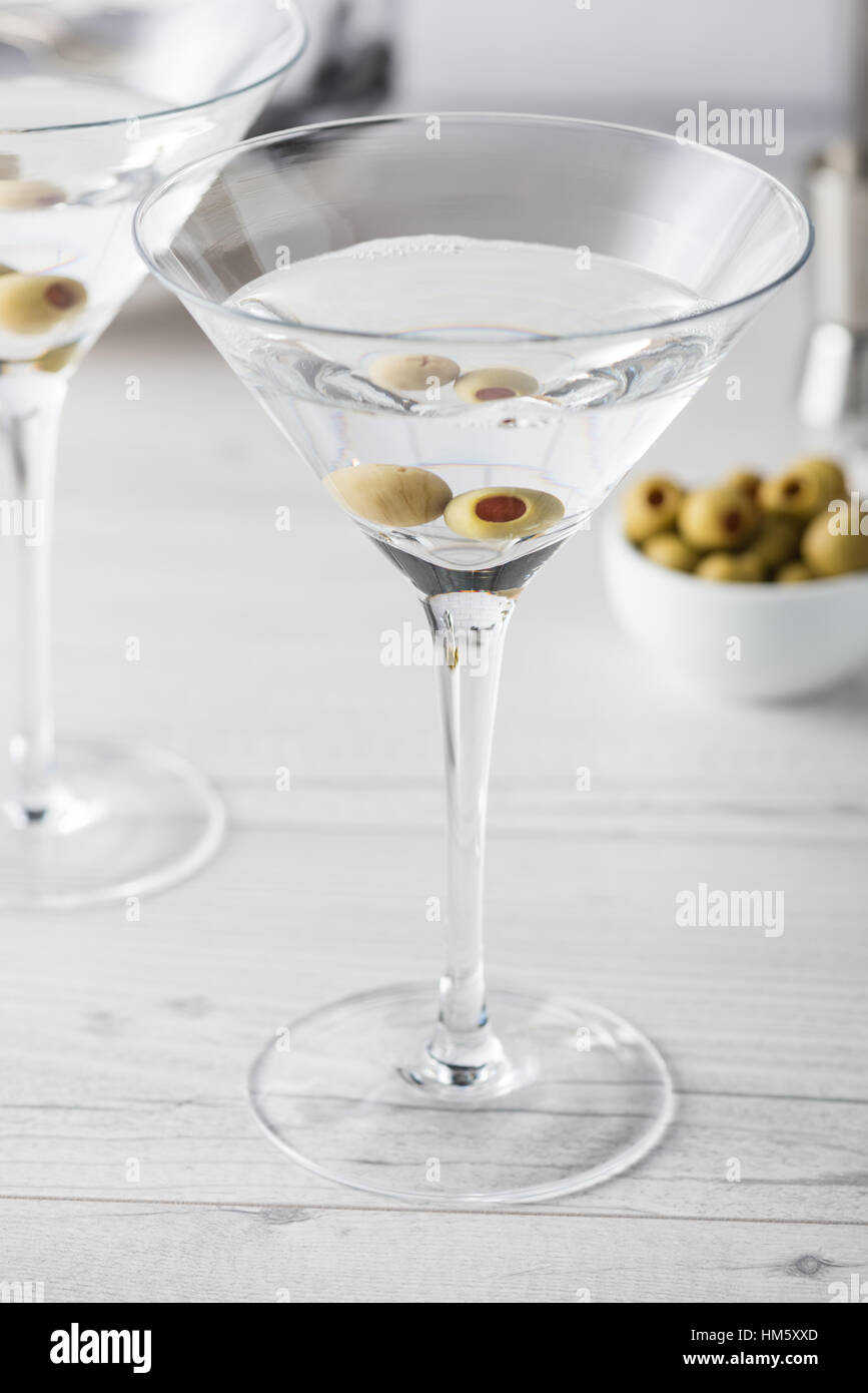 Fresh home made vodka martini cocktails with olives Stock Photo - Alamy