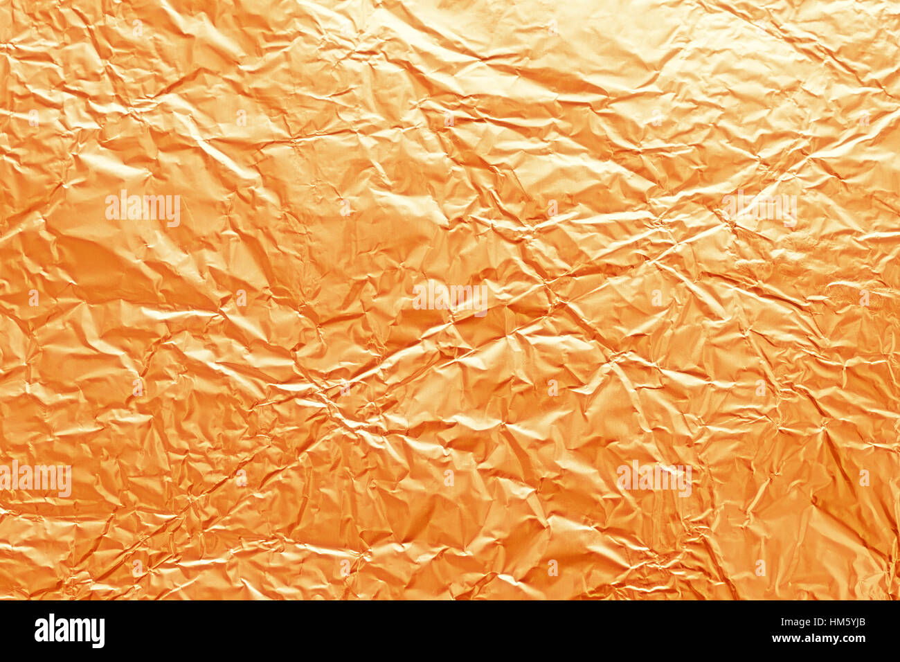 The texture of crumpled metal gilded foil Stock Photo - Alamy
