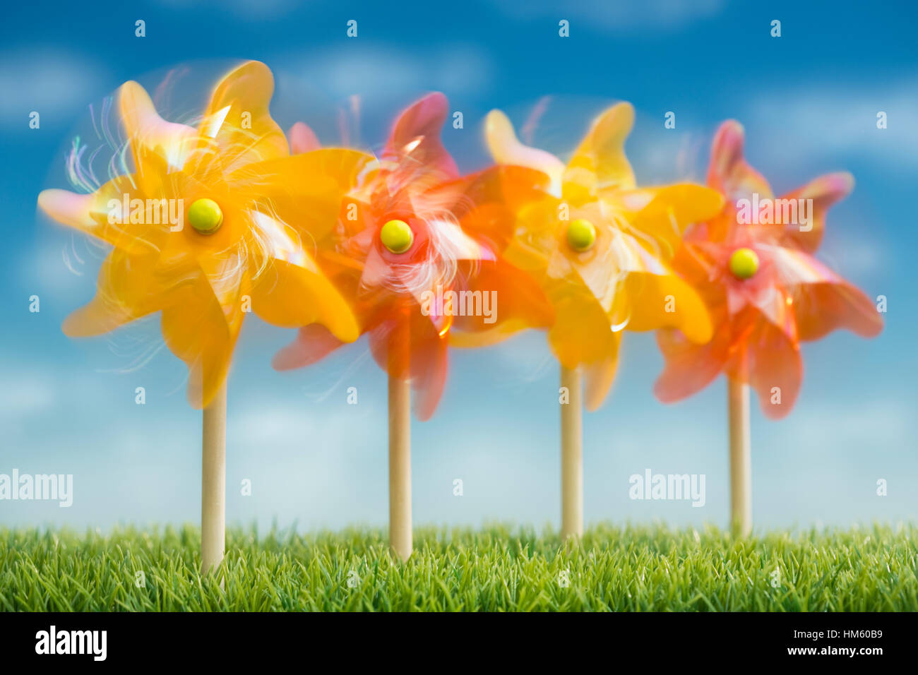 Pinwheel on green grass Stock Photo - Alamy