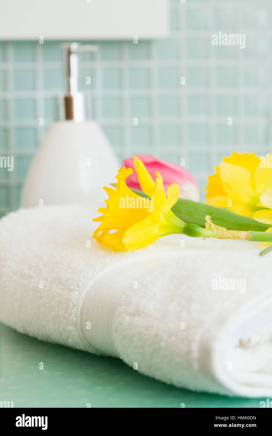 Daffodil on white towel Stock Photo - Alamy
