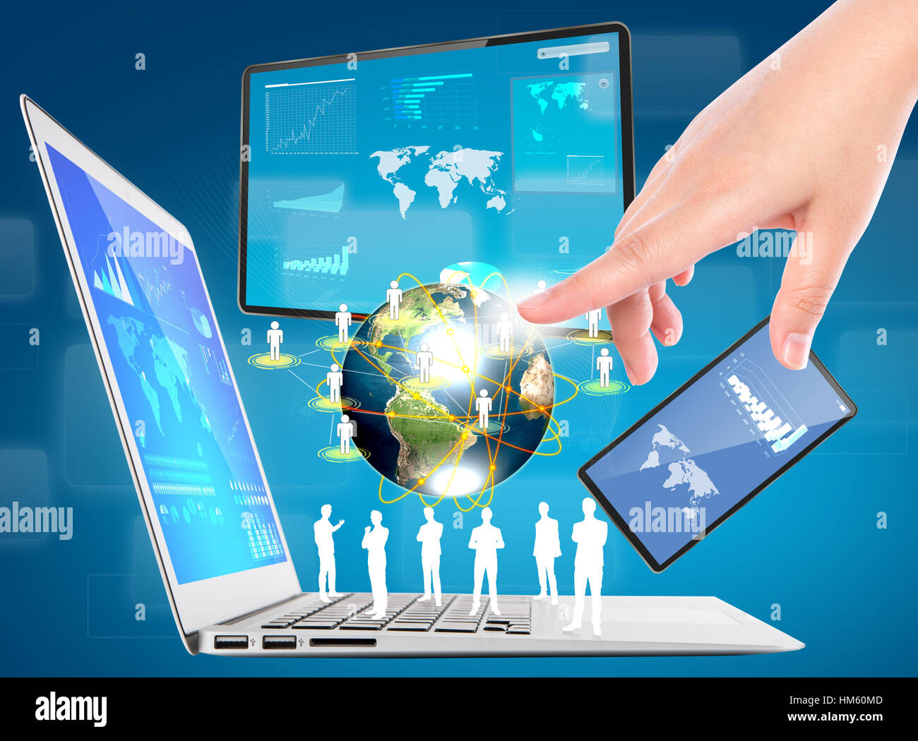 Business hand with laptop,mobile phone,touch screen device (Elements of ...
