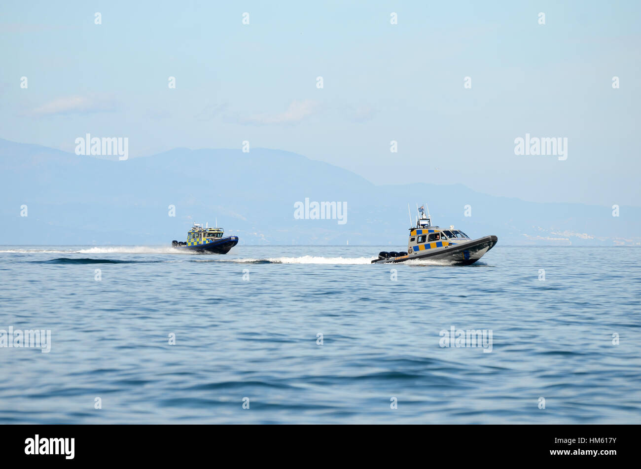 Gibraltar customs boat and a Gibraltar police boat patrolling the ...