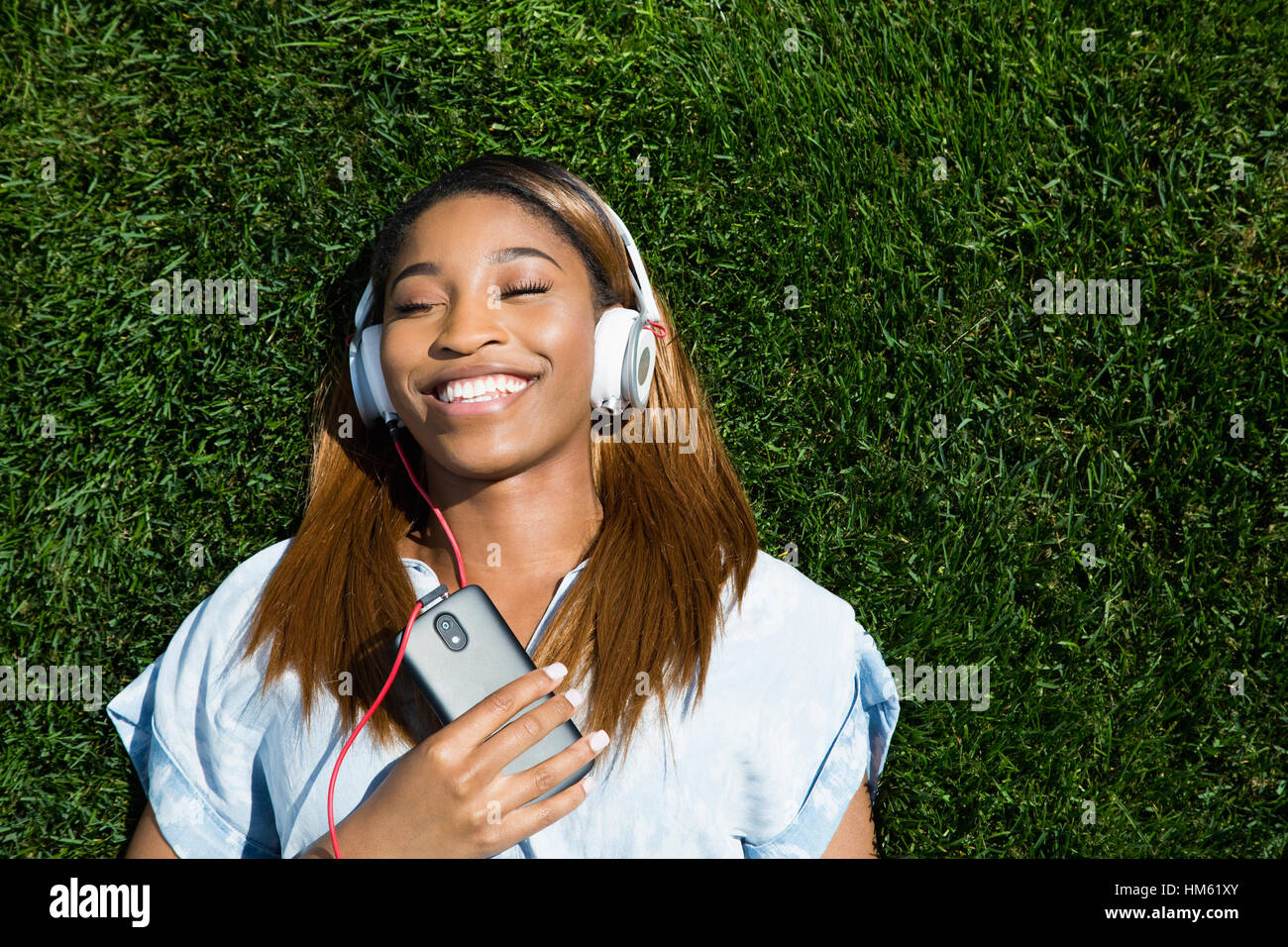 Half length smiling music hi-res stock photography and images - Alamy