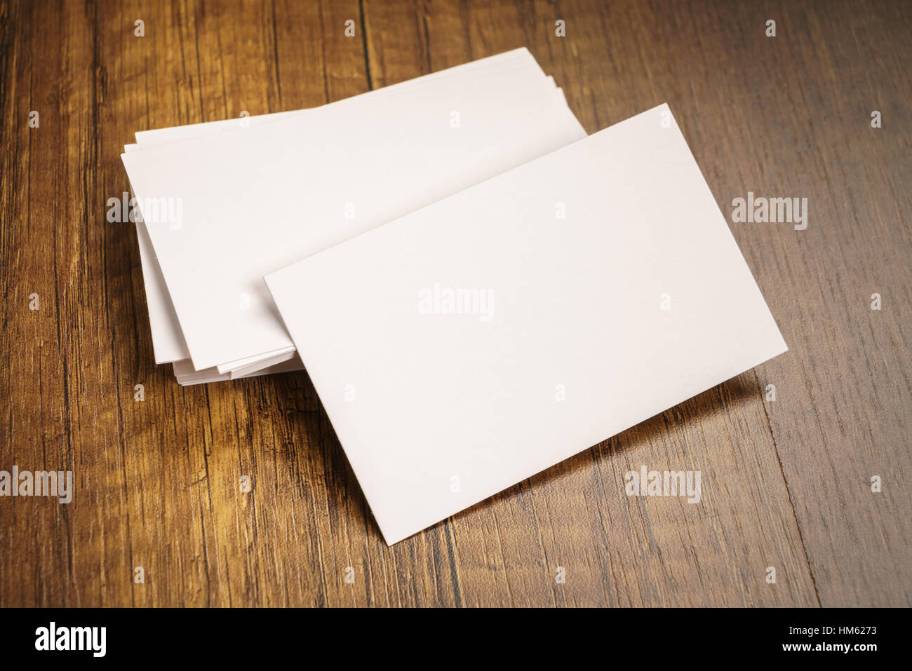 Business cards on wood table Stock Photo - Alamy
