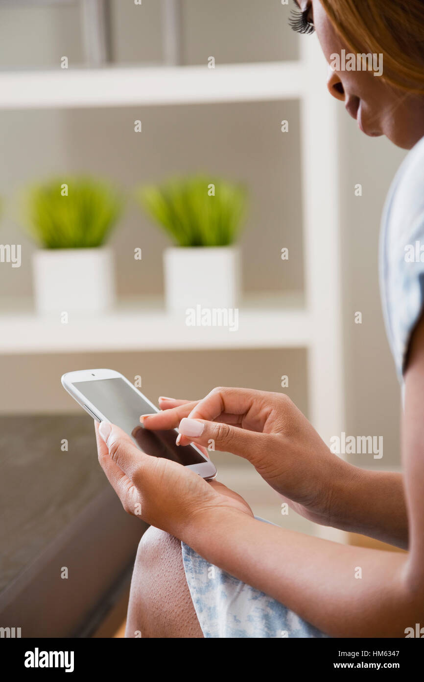 African american youth smart phone hi-res stock photography and images ...