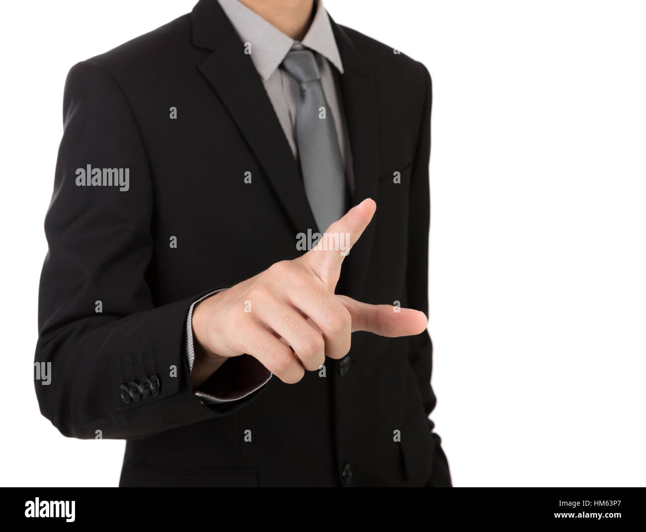 Business man touching an imaginary screen against white background ...