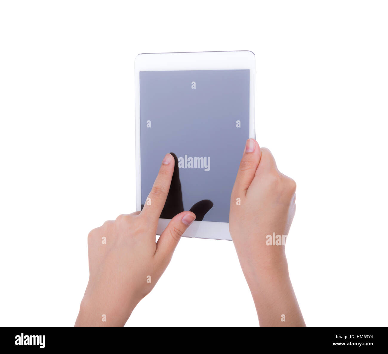 Woman hand using a touch screen device against white background Stock ...