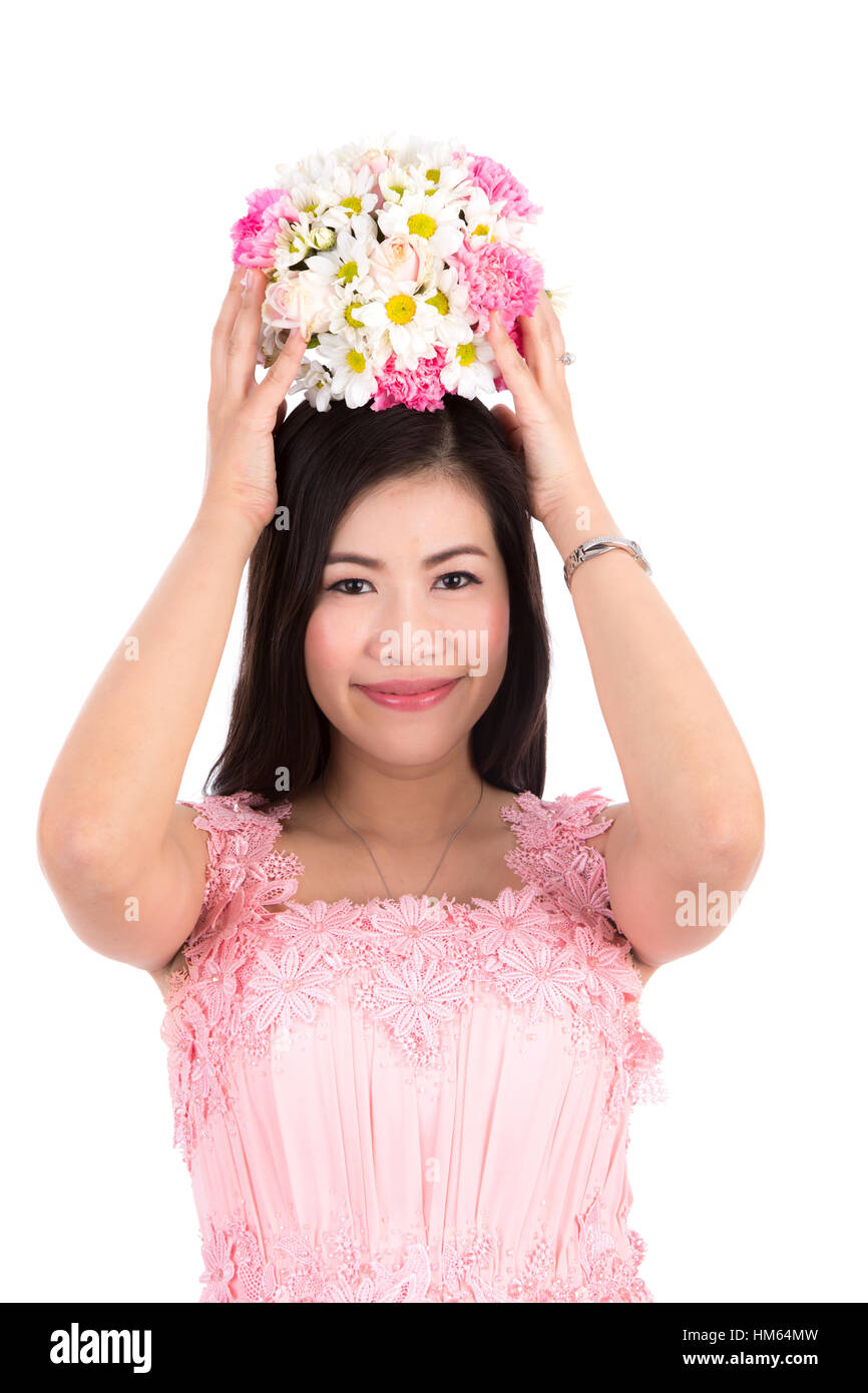 Woman smiling showing flowers isolated on white background Stock Photo ...