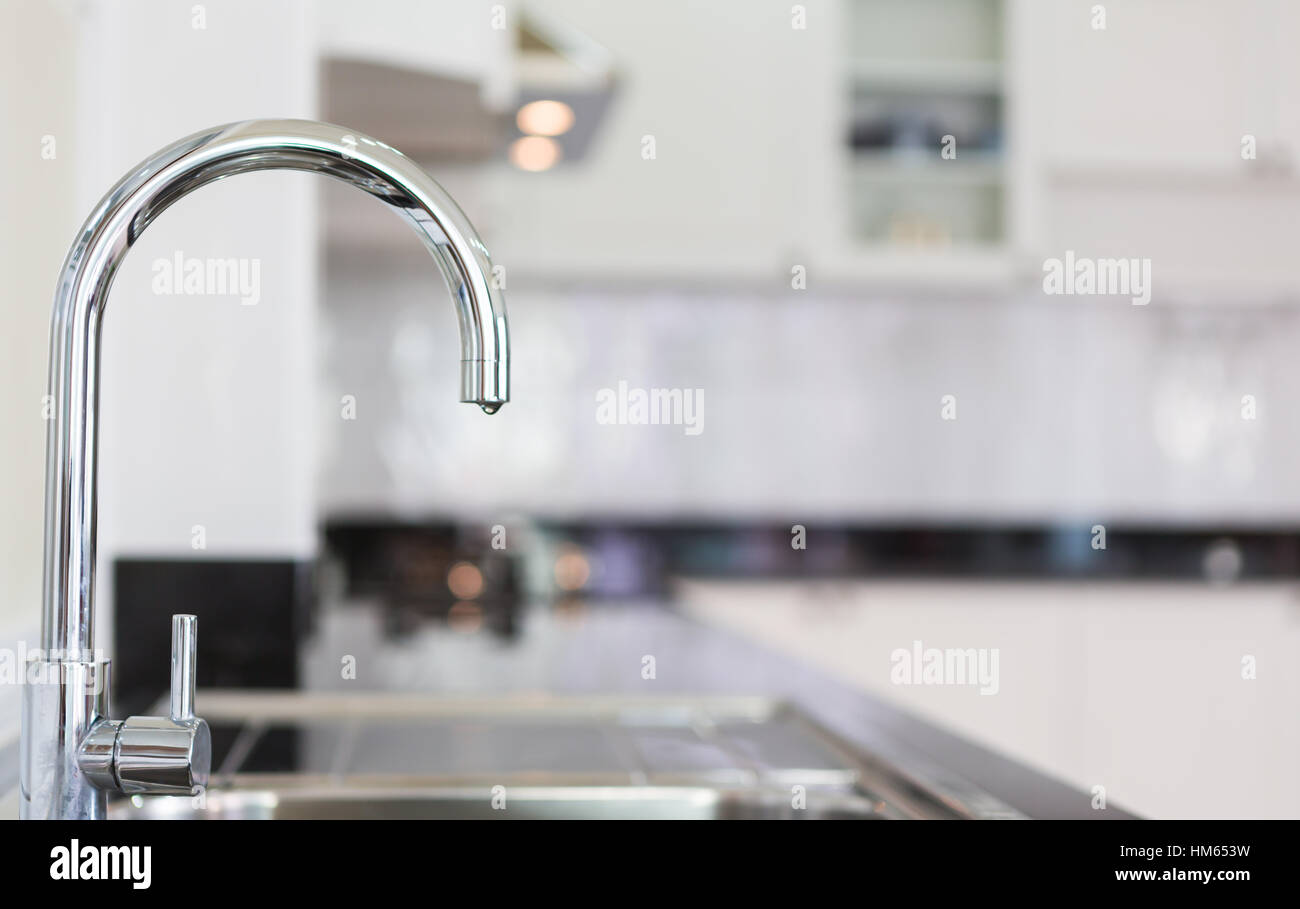 Water tap in the kitchen Stock Photo - Alamy