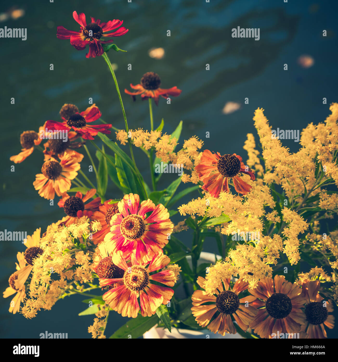 Bouquet of bright colorful summer flowers, square vintage toned photo ...