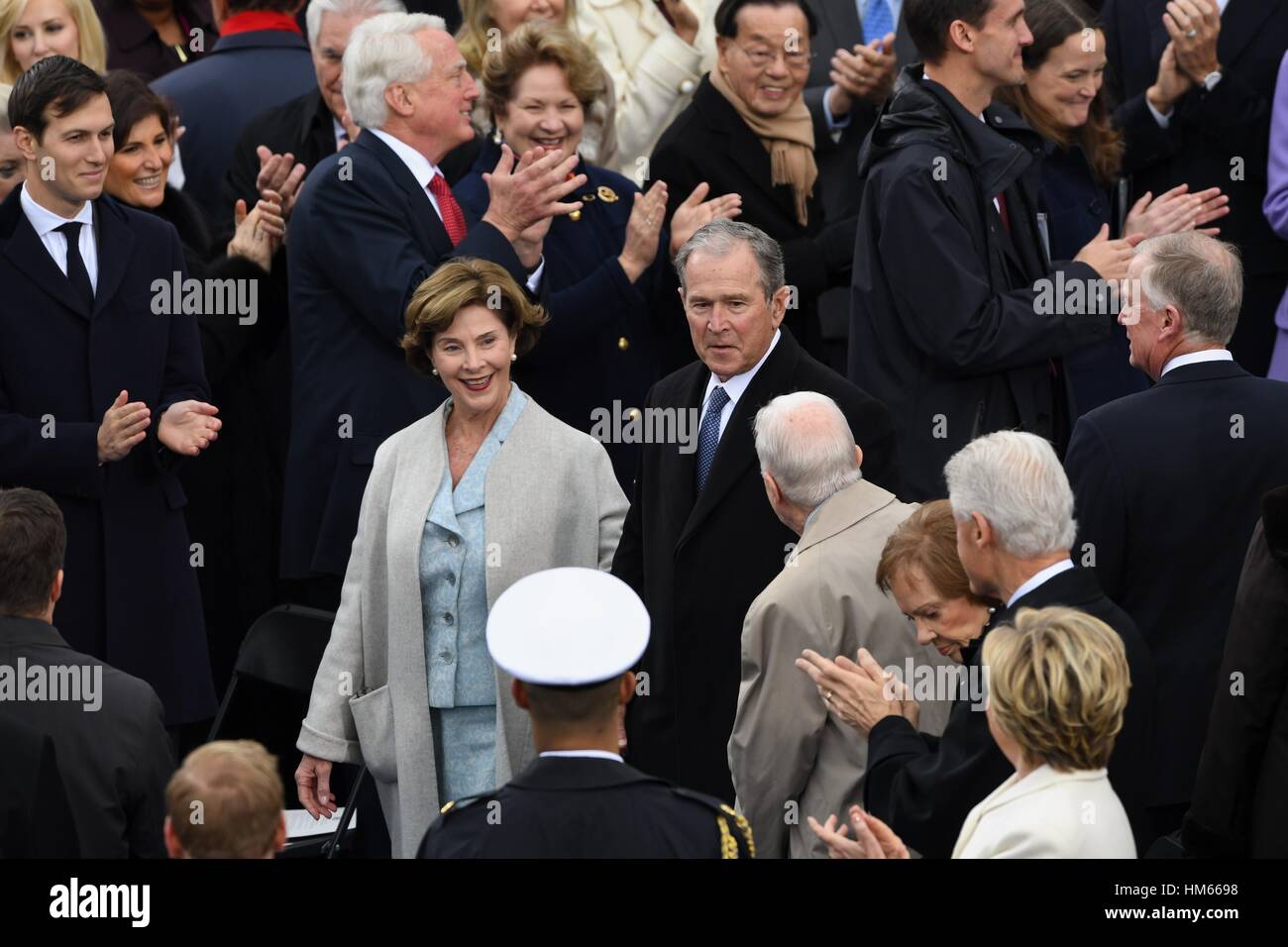 Former President George W. Bush and wife Laura Bush arrive for the ...