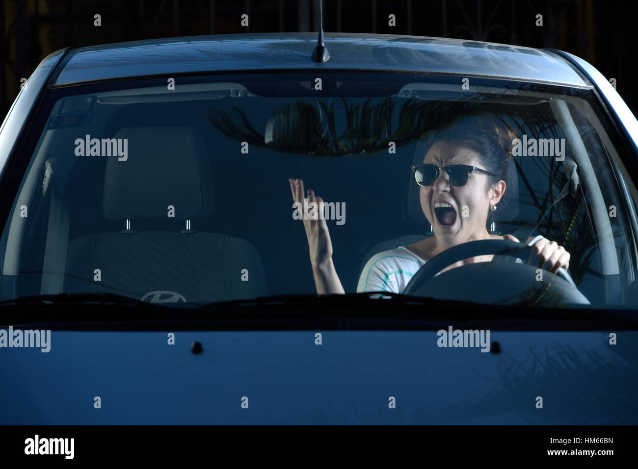 Angry woman driving car hi-res stock photography and images - Alamy