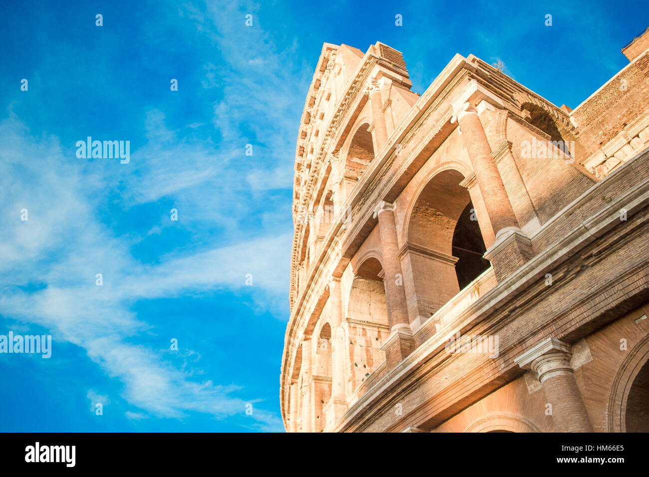 Colosseum or Coliseum background blue sky in Rome, Italy Stock Photo ...