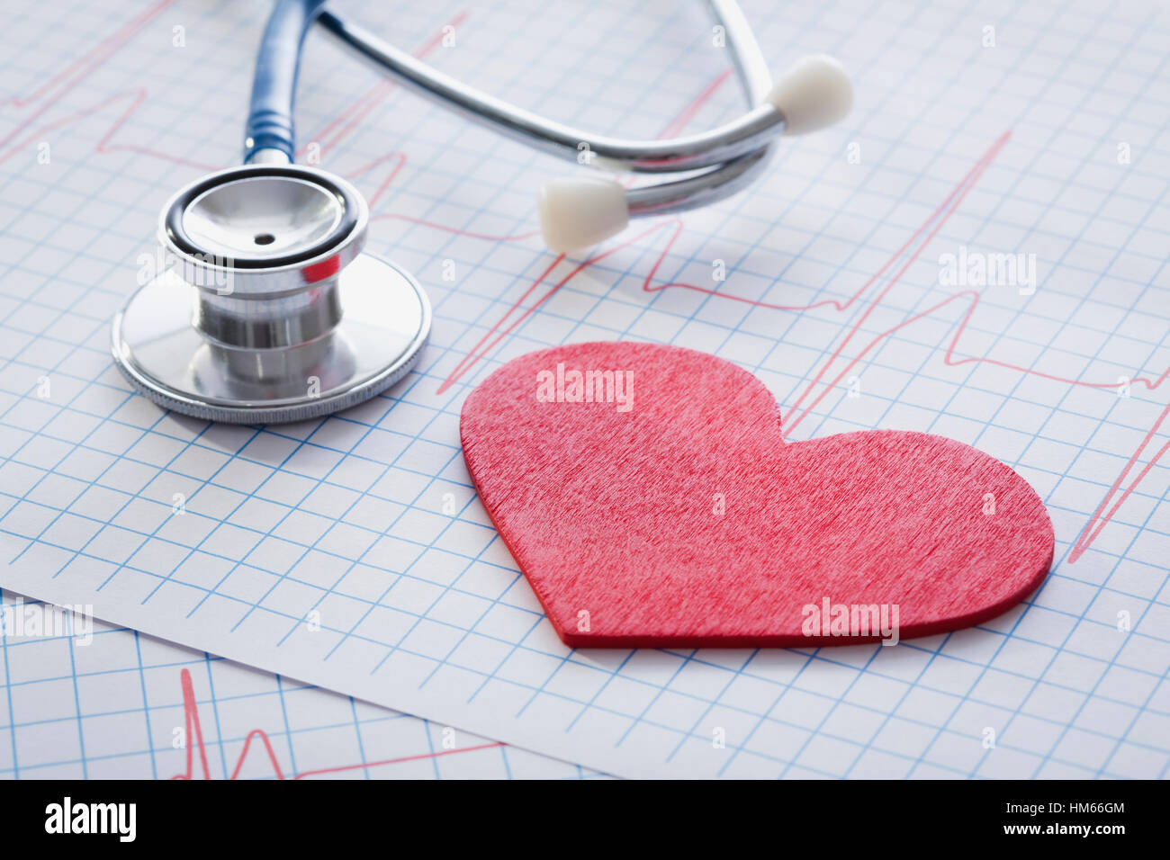 Stethoscope and red heart on paper with pulse trace Stock Photo - Alamy