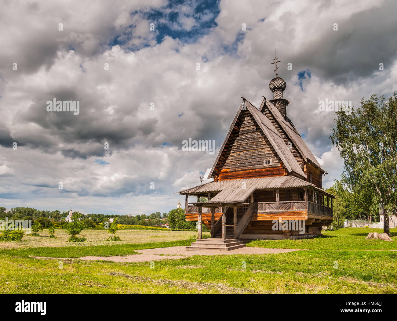 The traditional russian wooden church before the storm in the ancient ...