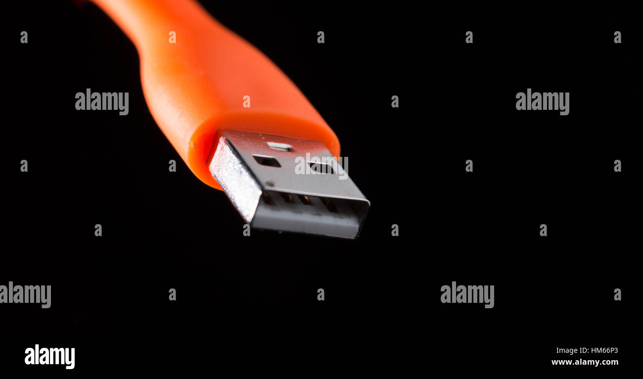 Connecting cord on black background Stock Photo - Alamy