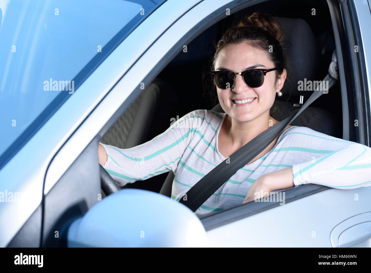 young girl driver with sunglasses sit in car Stock Photo - Alamy