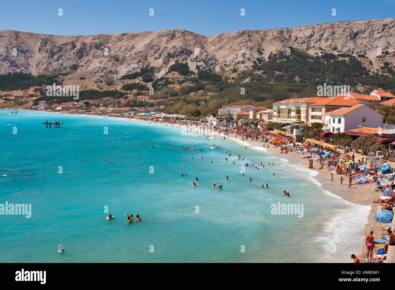 BASKA, CROATIA - AUGUST 08: People have a rest on the beach of ...