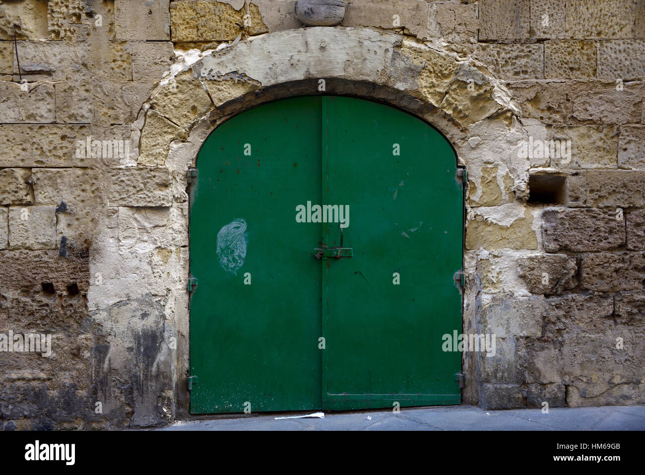 Old door doorway dilapidated run down untended decrepit Valletta Malta ...