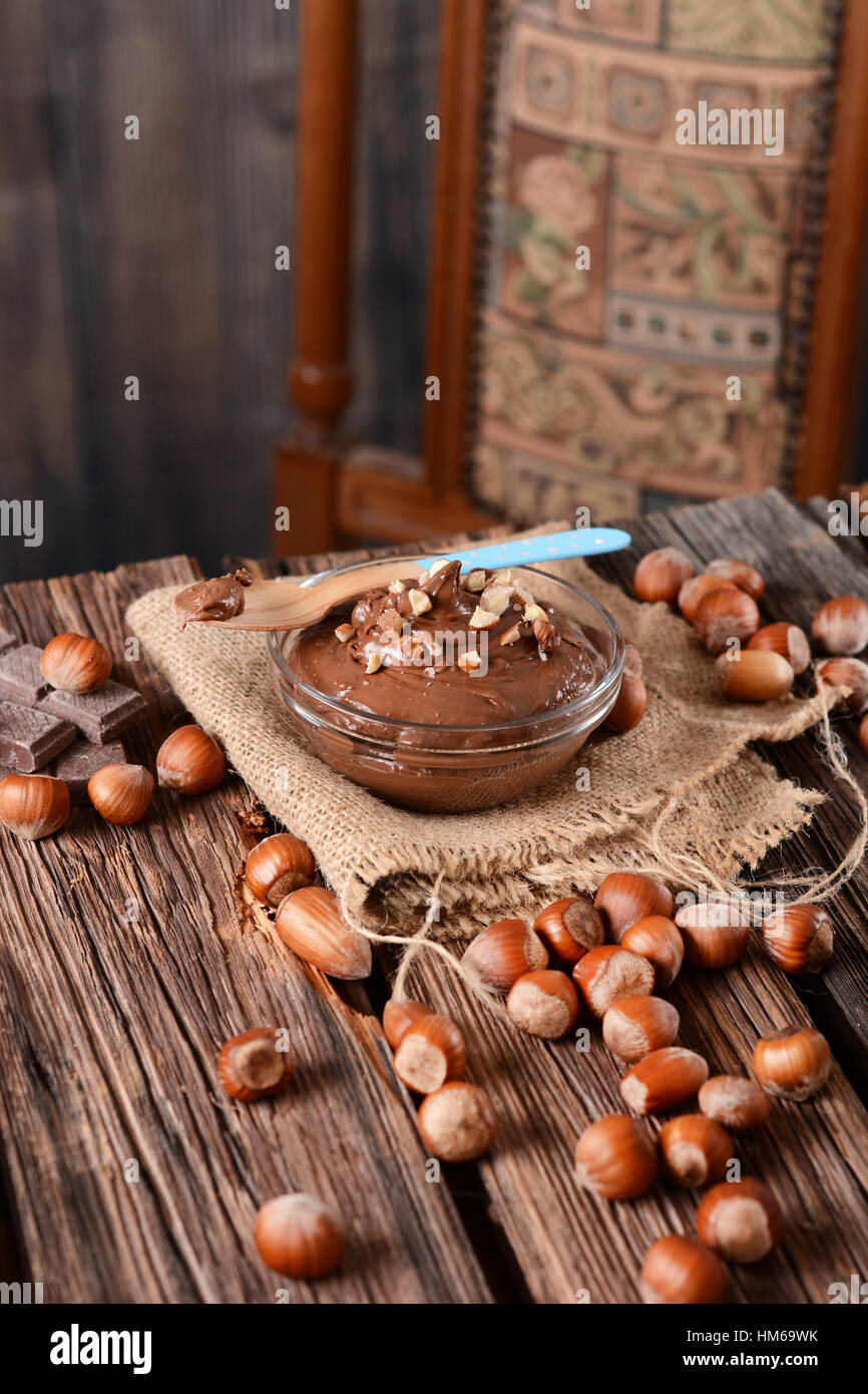 cream of chocolate with hazelnuts inside the glass bowl Stock Photo - Alamy