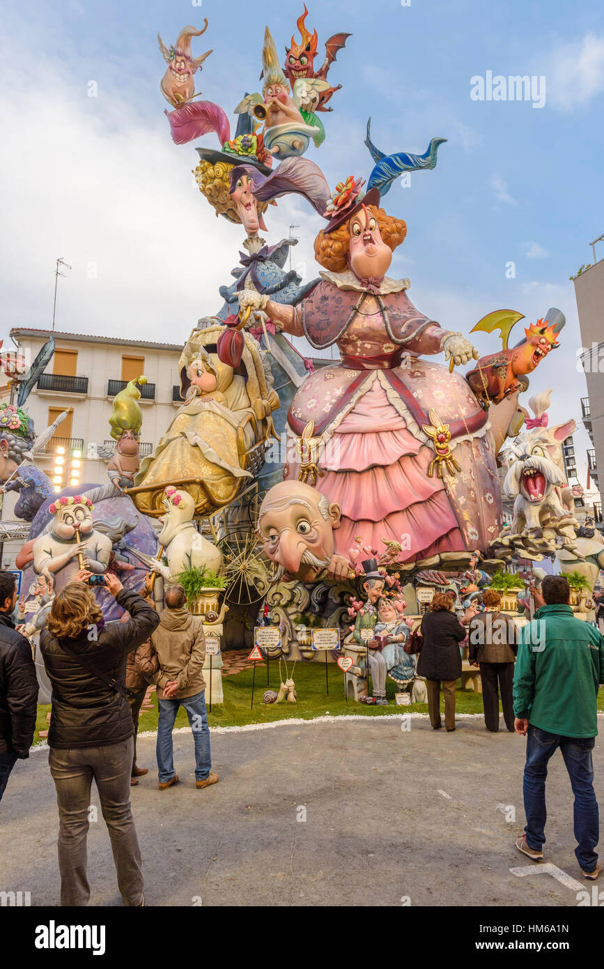 People admiring the huge sculptures at the Fallas of Valencia Festival ...