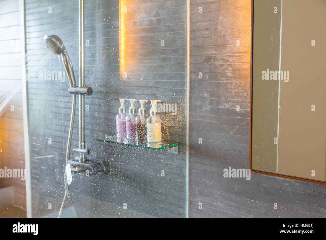 Shower while running water Stock Photo - Alamy