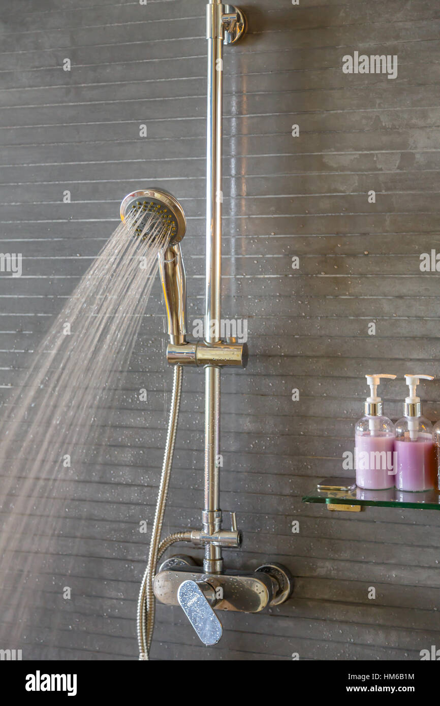 Shower while running water Stock Photo - Alamy