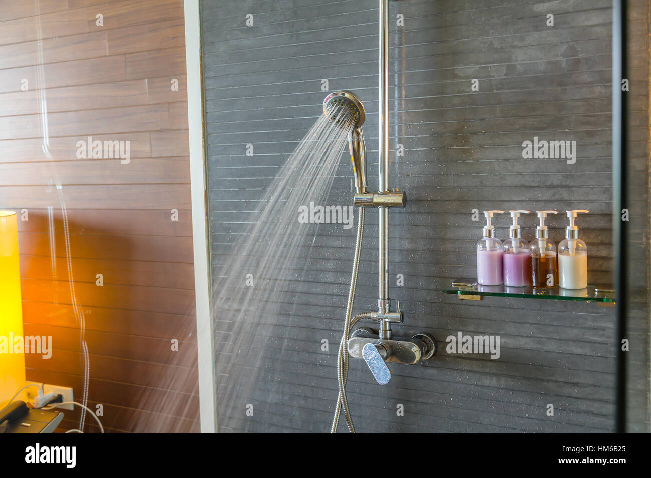 Shower while running water Stock Photo - Alamy